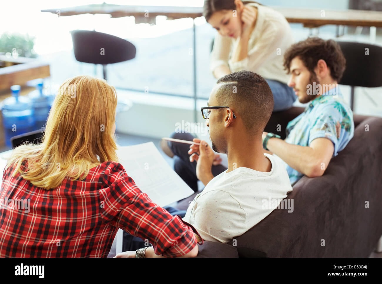 Office woman sitting down on sofa hi-res stock photography and images ...