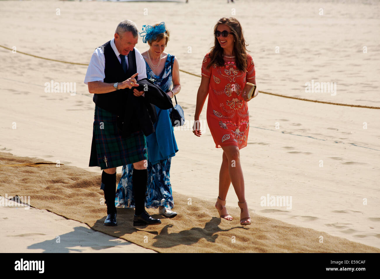 Guests arrive at beach wedding at Bournemouth beach in July Credit ...