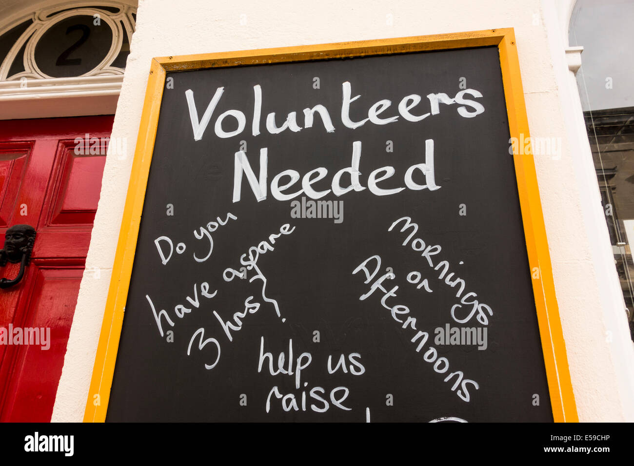 Handwritten board asking for Volunteers, UK Stock Photo - Alamy