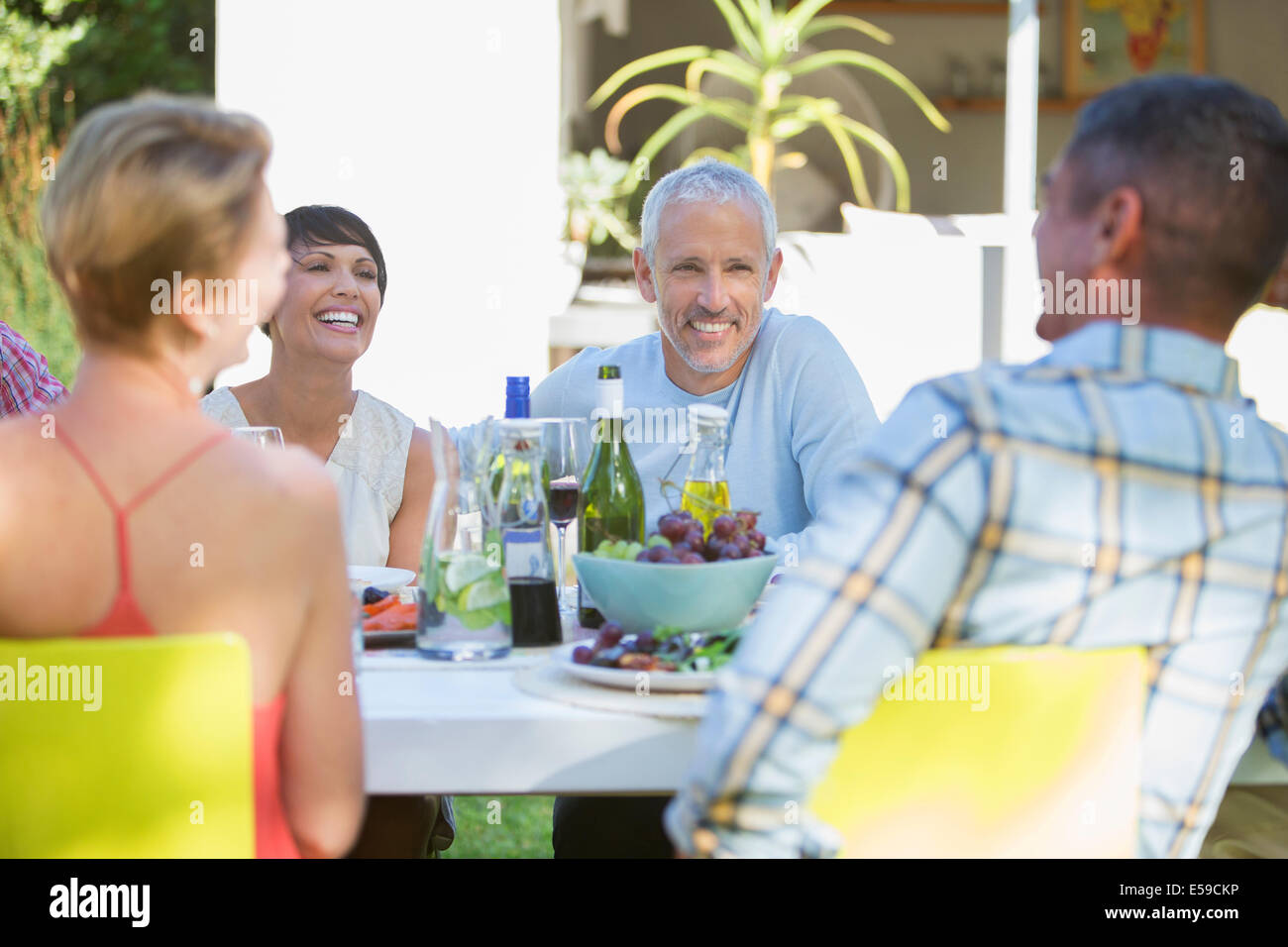 Friends eating together outdoors Stock Photo - Alamy