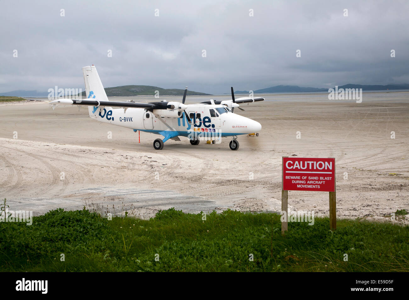 Flybe plane on sandy airstrip Isle of Barra airport , Outer Hebrides ...