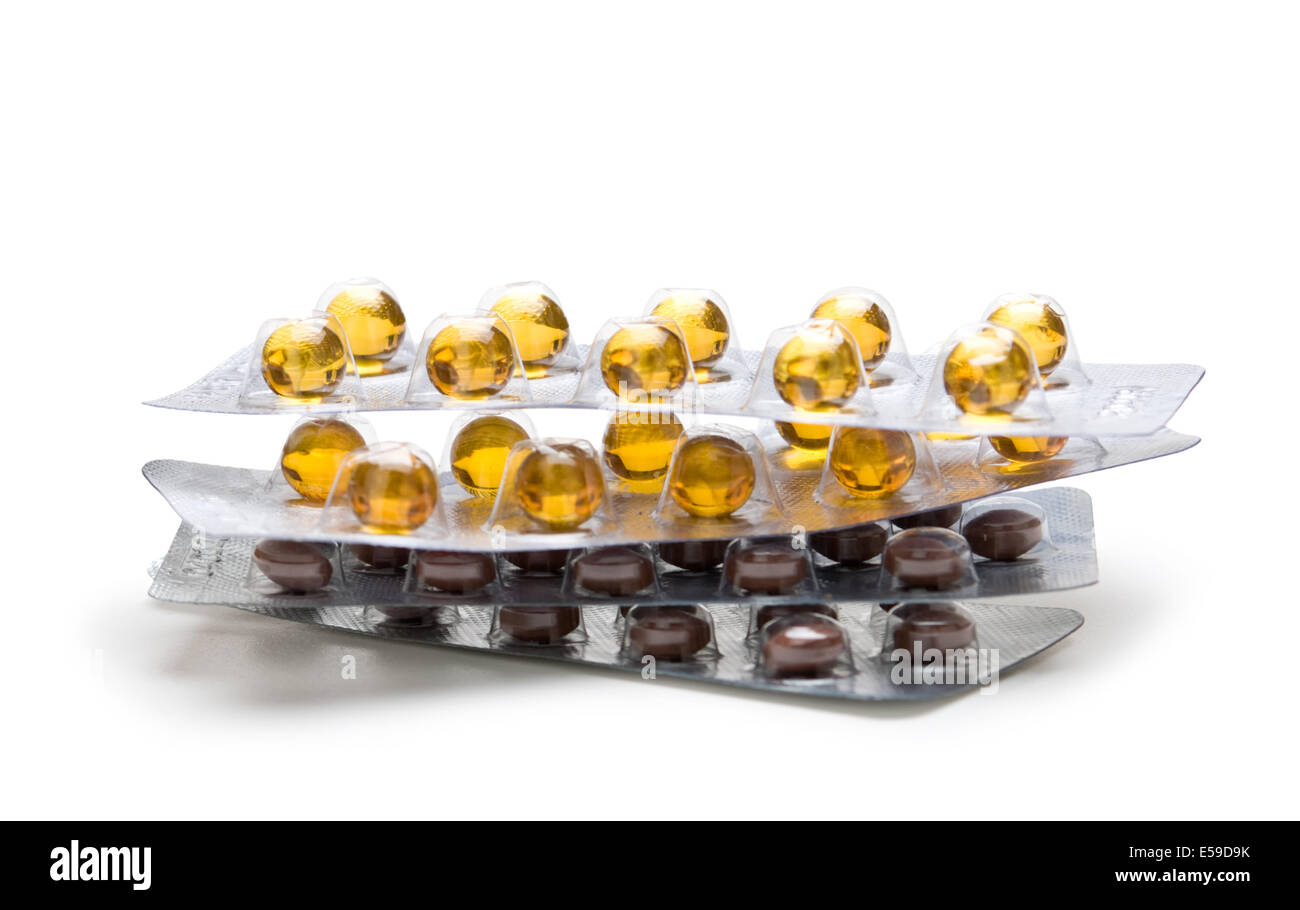 stack of packages of tablets isolated Stock Photo - Alamy