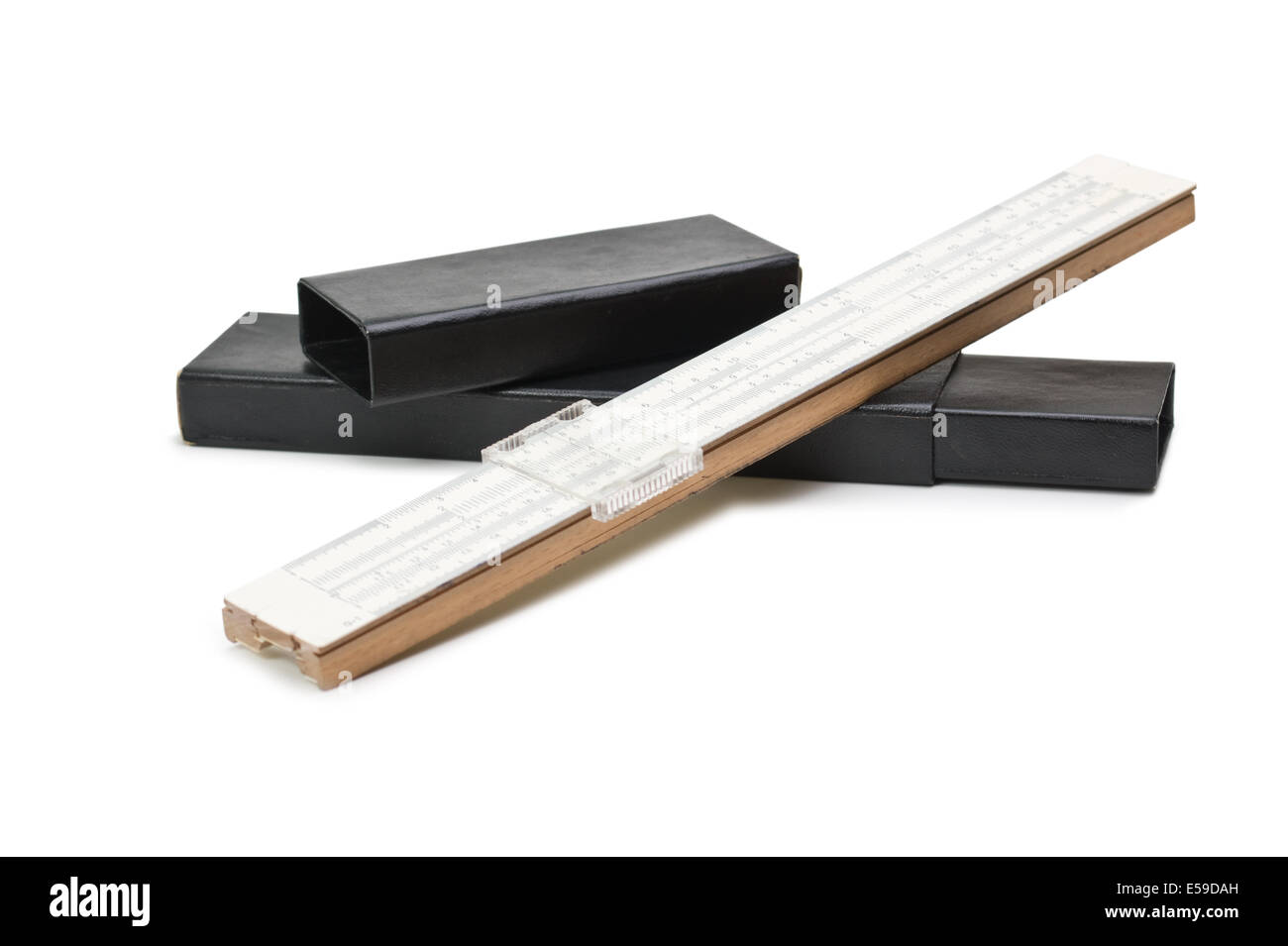 Slide rule and box isolated on white background Stock Photo - Alamy