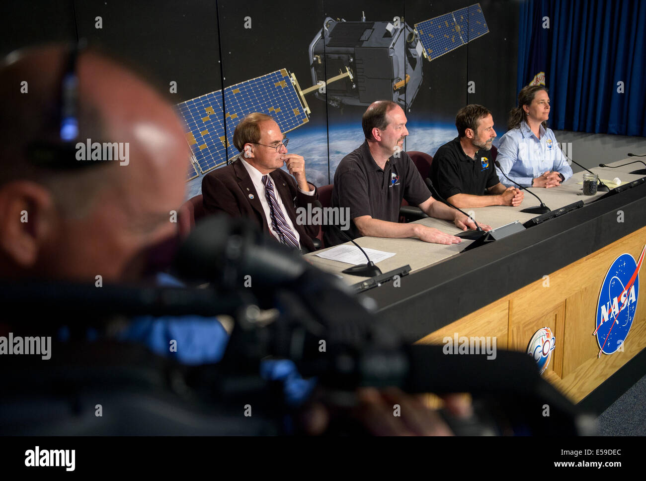 From left, NASA Kennedy Space Center Public Affairs Officer George ...