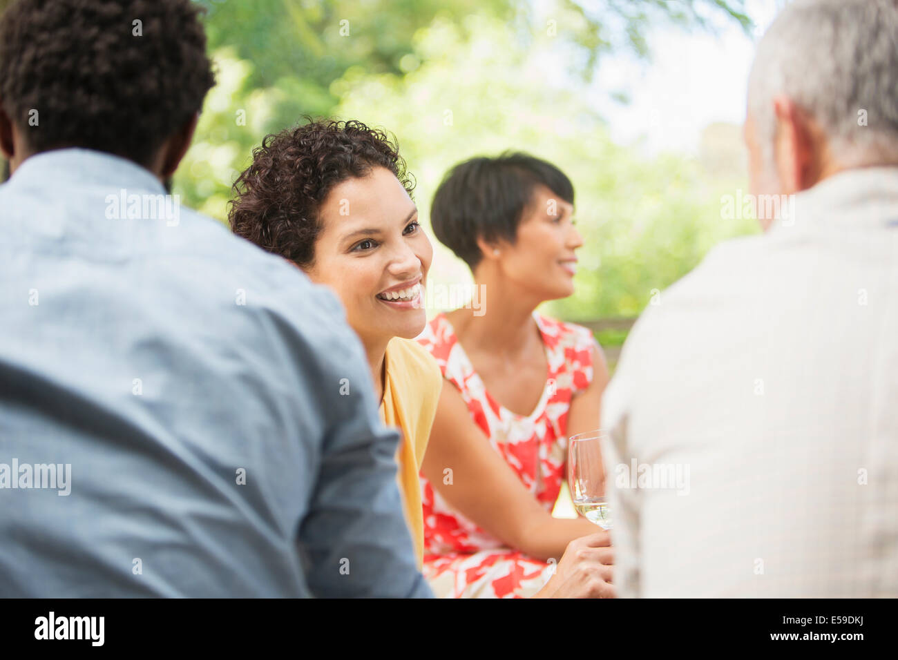 Couple talking at party Stock Photo - Alamy