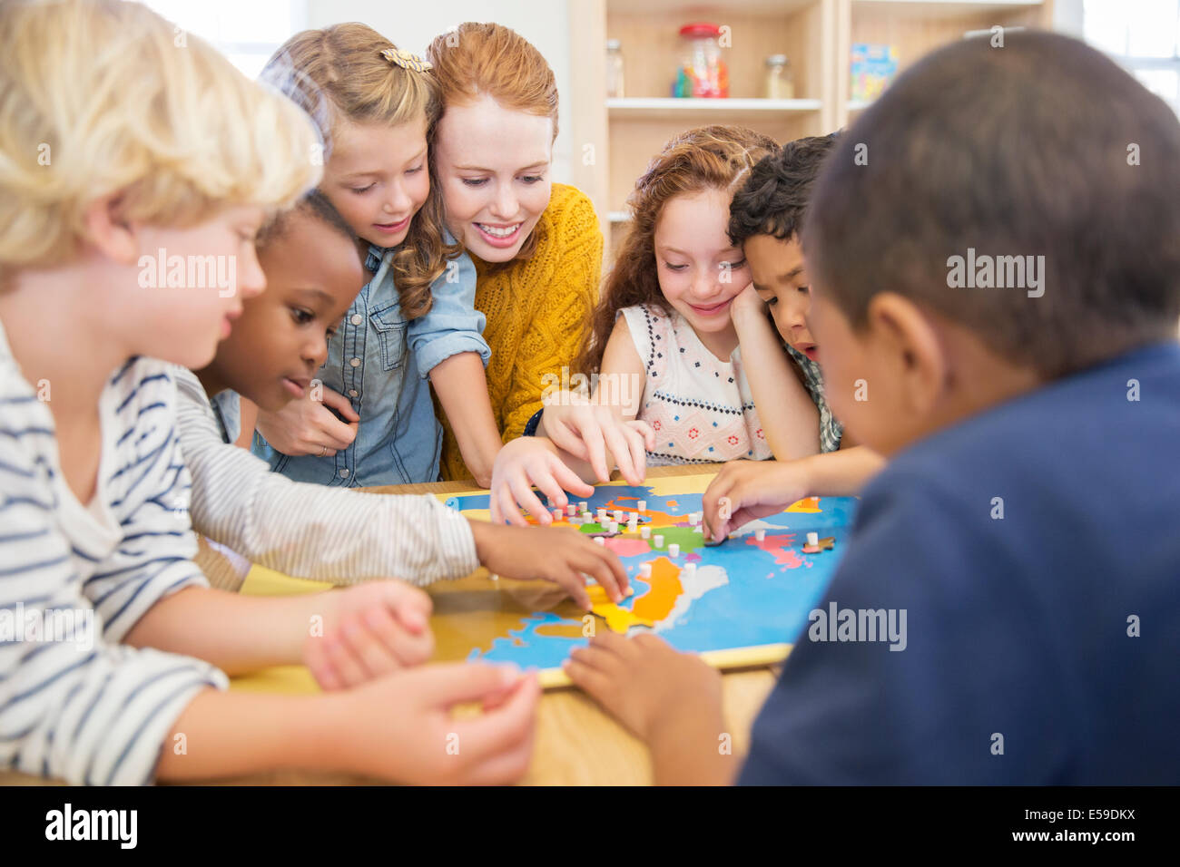 Group school children playing classroom hi-res stock photography and ...