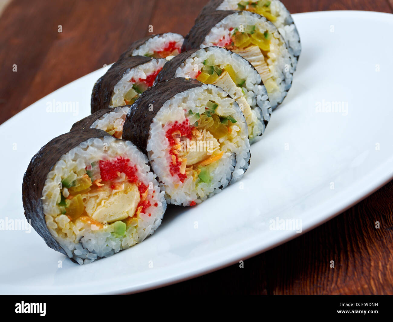 Japanese sushi.Roll made with chicken, eggs and vegetables Stock Photo ...
