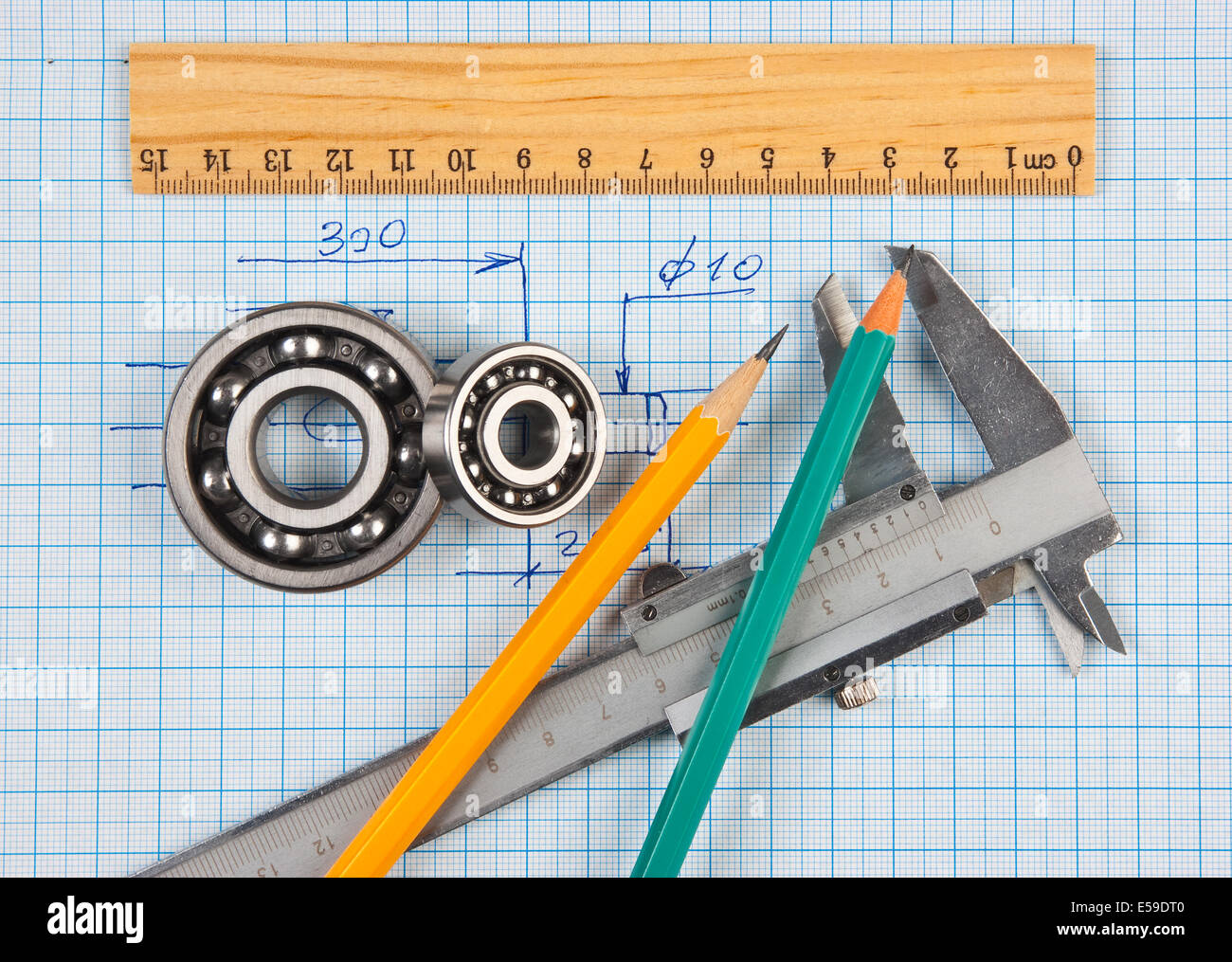 technical tools on a background of graph paper Stock Photo - Alamy