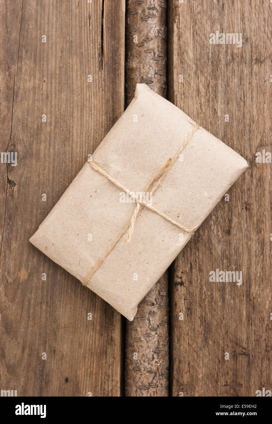 parcel wrapped with brown kraft paper and tied with twine Stock Photo ...