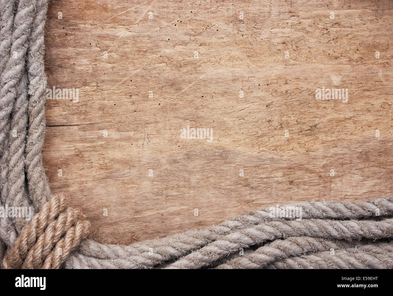 picture frame of rope on a old wooden background Stock Photo - Alamy