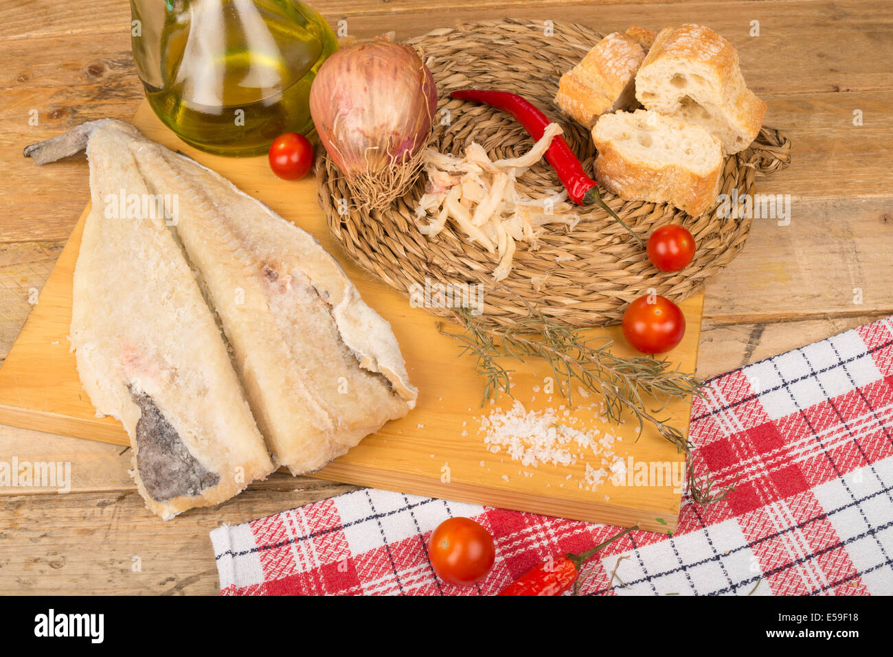 Still life with salt cured cod fish and Mediterranean ingredients Stock ...