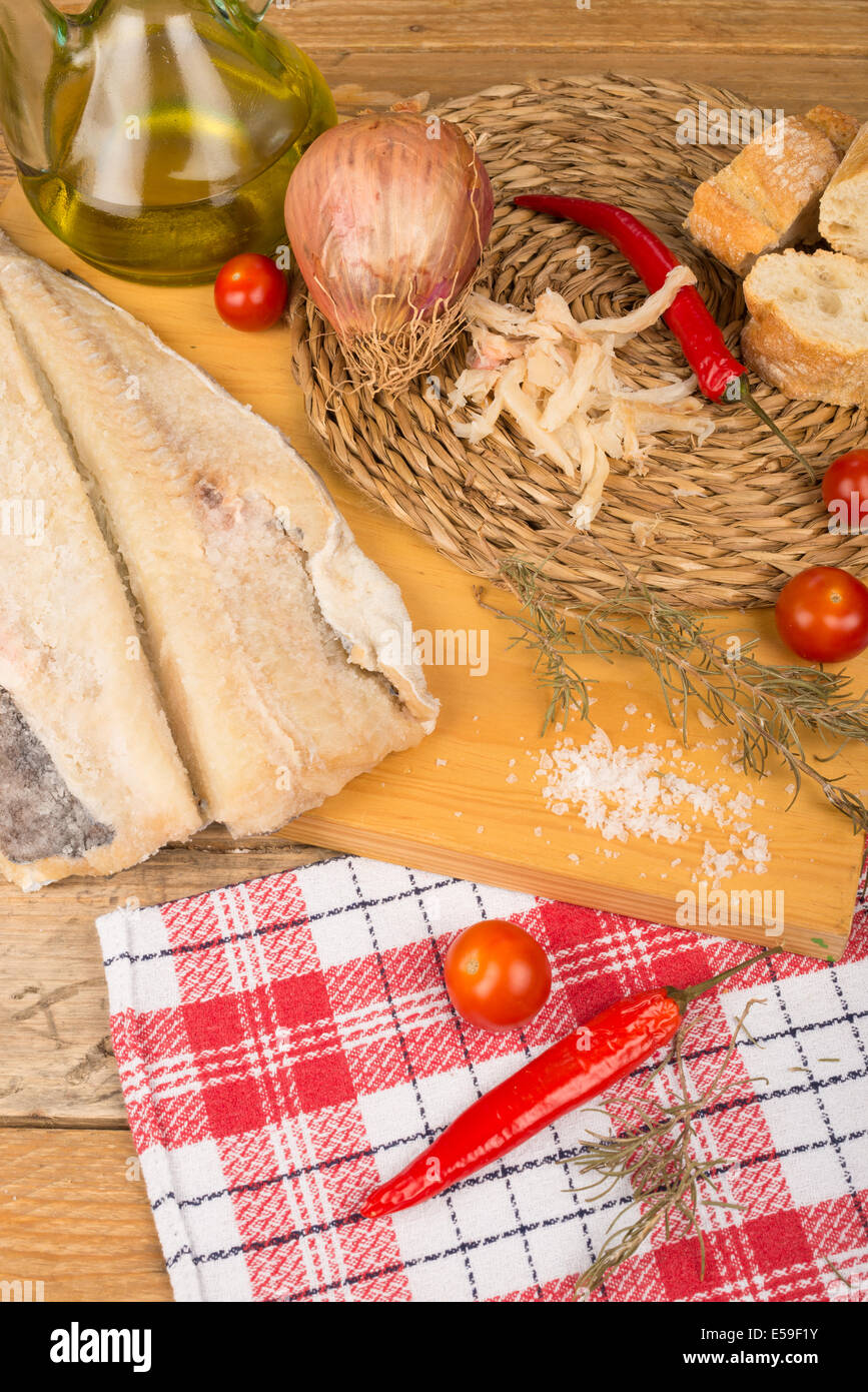 Salt cured cod fish surrounded by Mediterranean ingredients Stock Photo ...