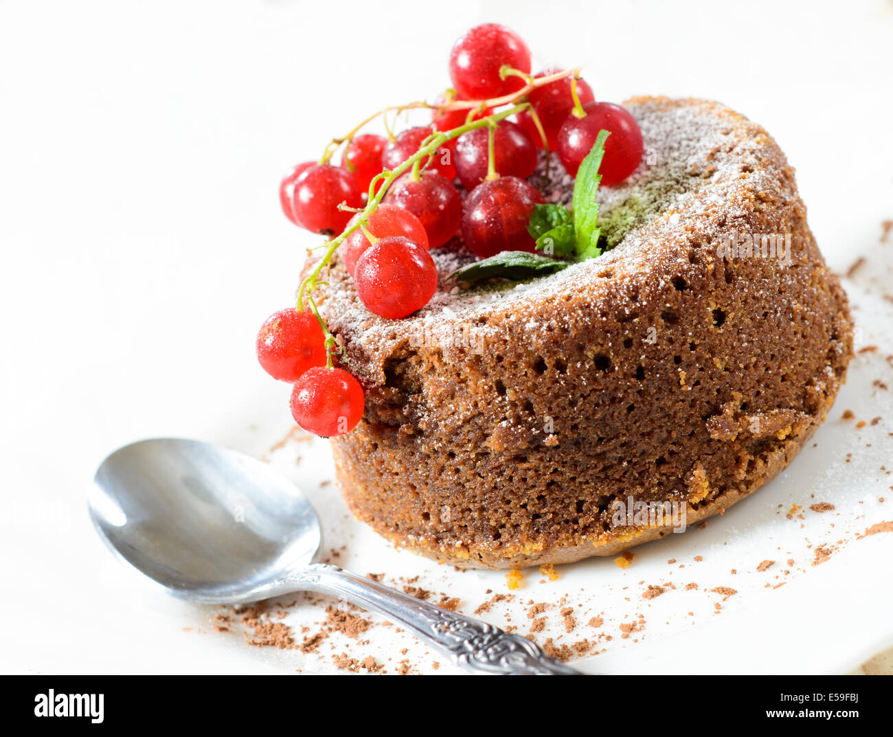 Juicy lava cake isolated on white background Stock Photo - Alamy