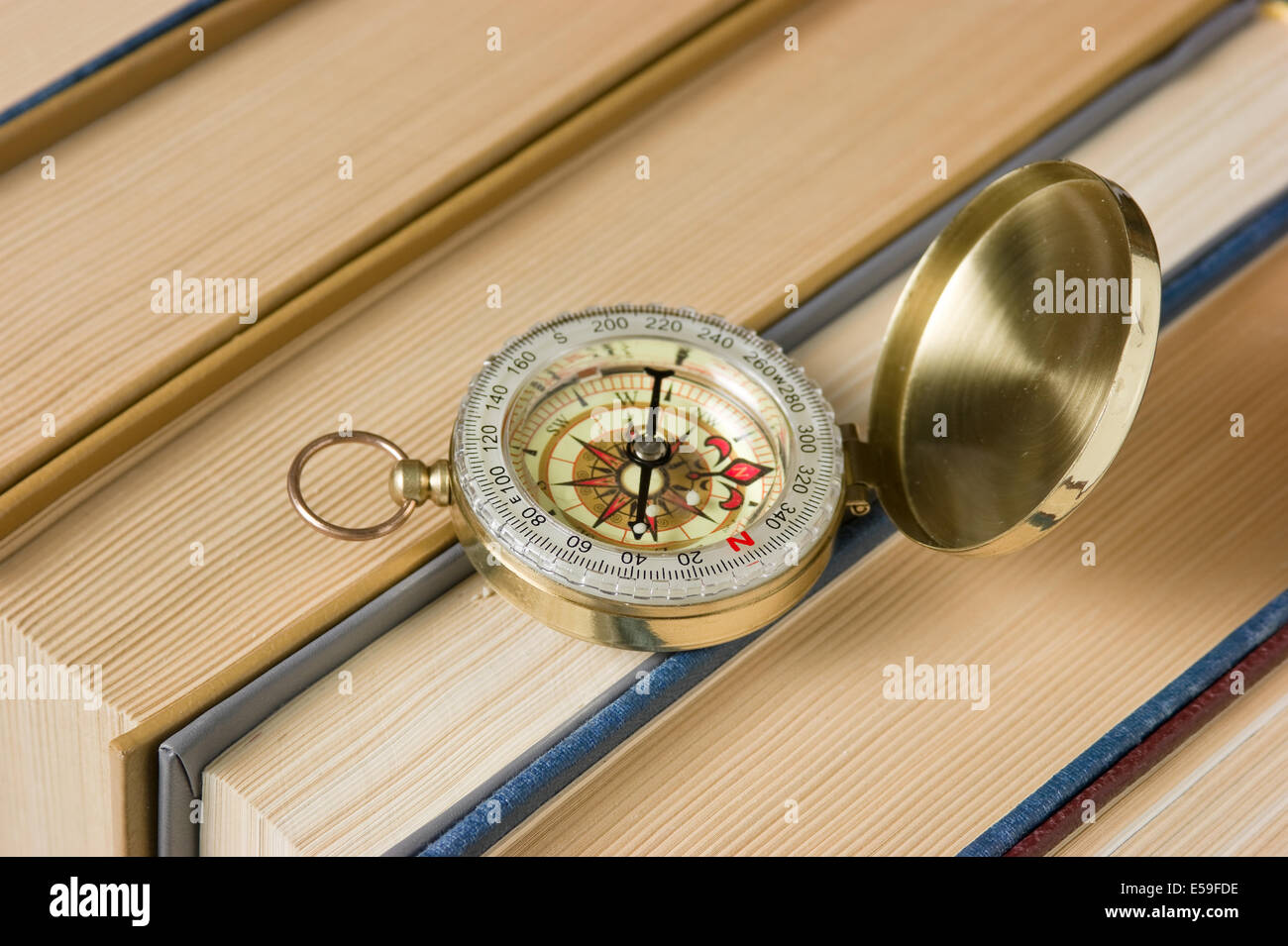 Compass books hi-res stock photography and images - Alamy