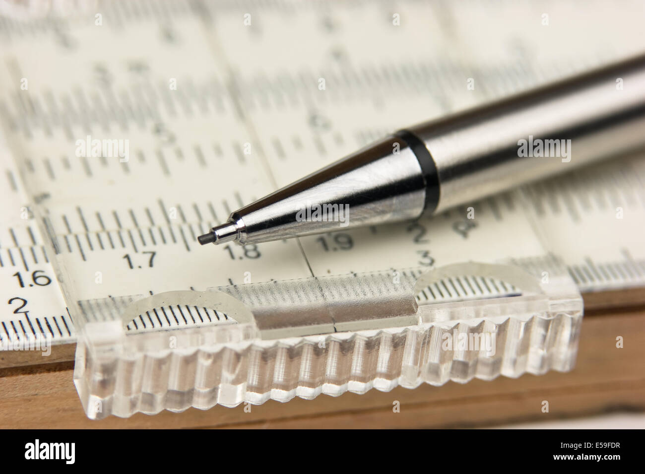 Vernier scale old logarithmic ruler and pencil Stock Photo - Alamy