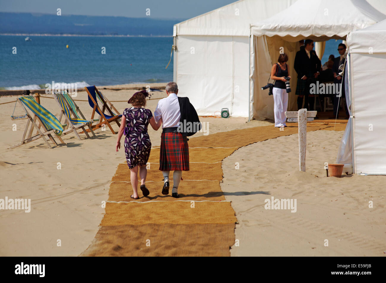 Guests arrive at beach wedding at Bournemouth beach in July Credit ...