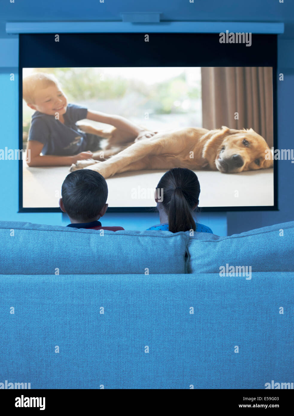 Children watching television in living room Stock Photo - Alamy