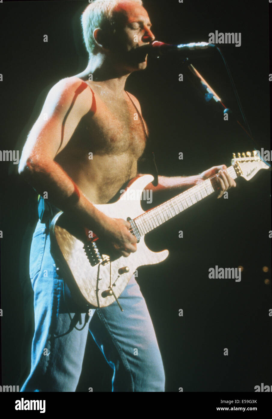 DEF LEPPARD US rock group with Phil Collen in August 1996. Photo ...