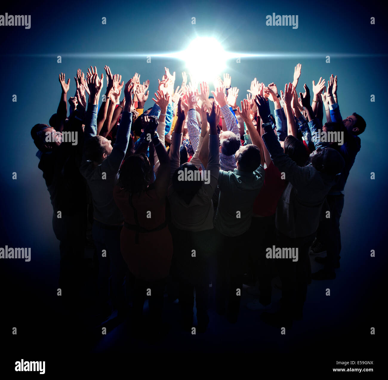 Diverse crowd reaching bright light hi-res stock photography and images - Alamy