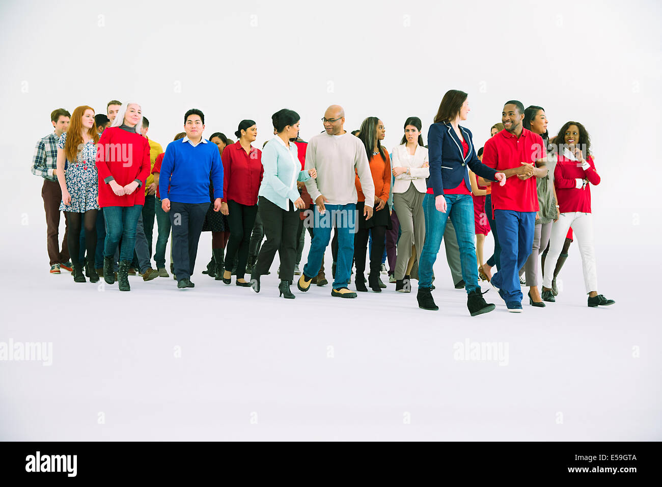 Walking smiling people hi-res stock photography and images - Alamy