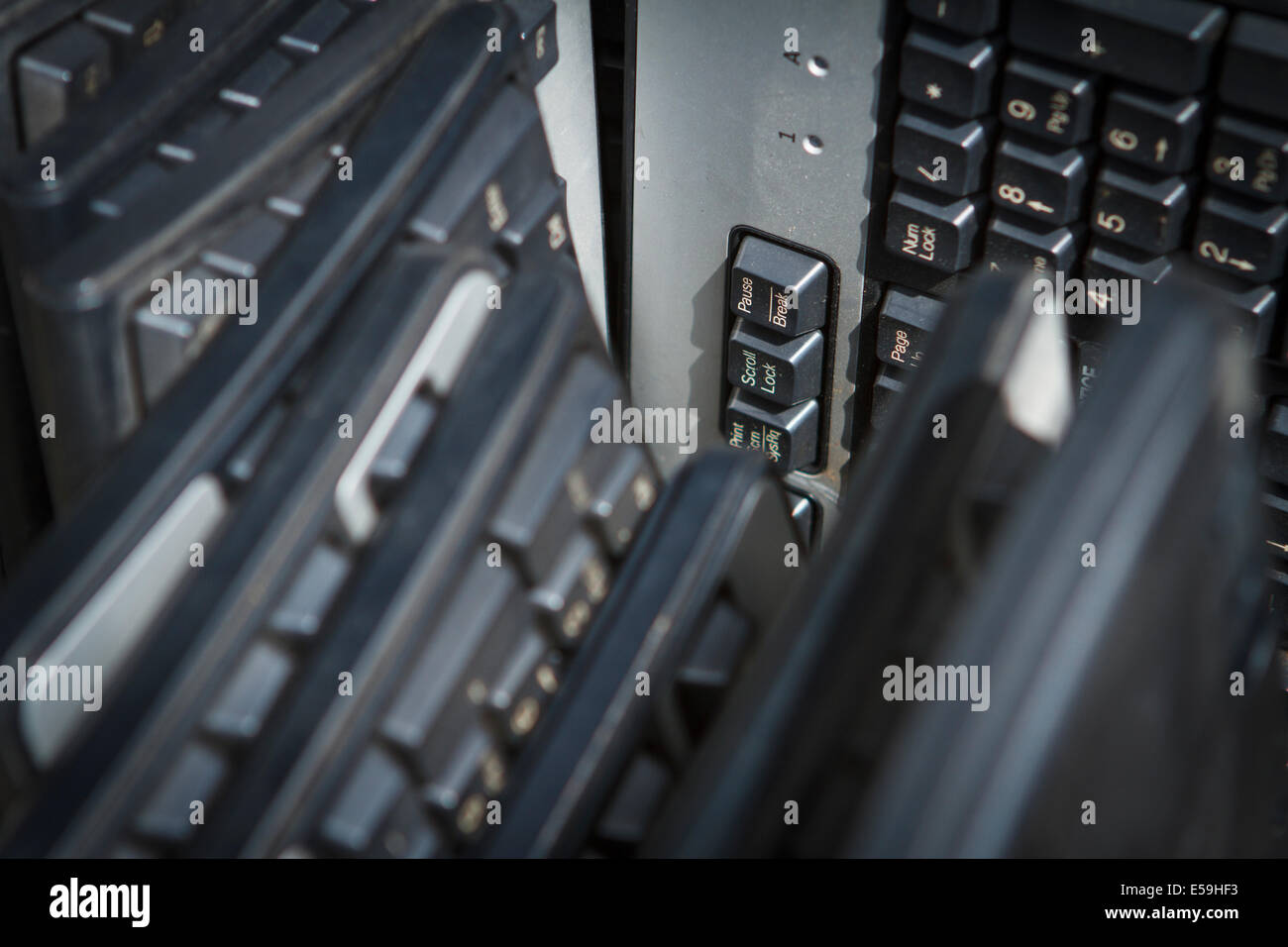 Pile of computer keyboards ready for recycling Stock Photo - Alamy