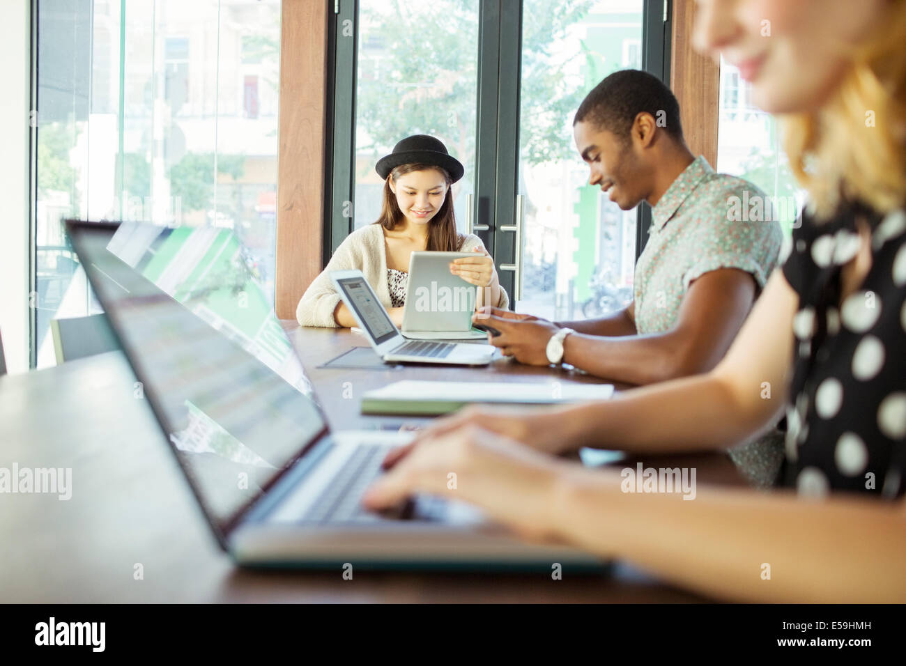 People working at conference table in office Stock Photo - Alamy