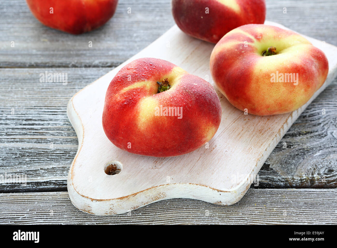three delicious peach, food closeup Stock Photo - Alamy