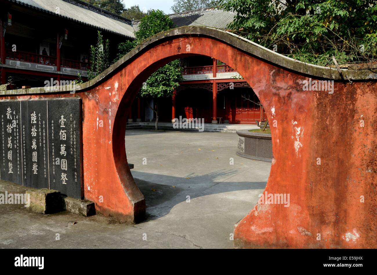 DAN JING SHAN TOWN (SICHUAN), CHINA: A rounded moongate at the Fo Shi ...