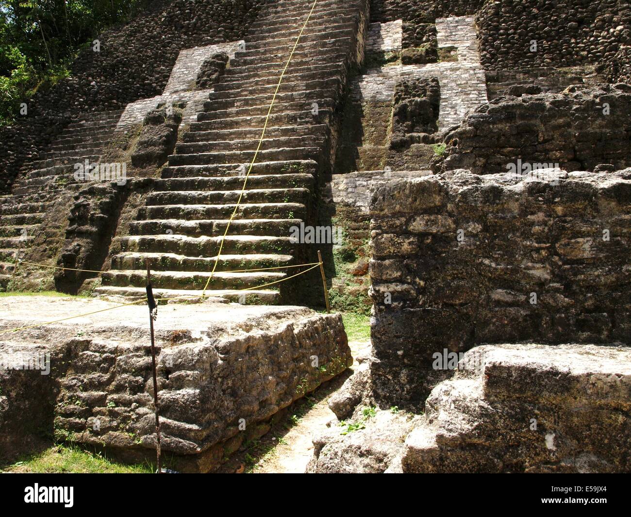 The stairs and sculpted faces on the High Temple at Lamanai, Belize ...