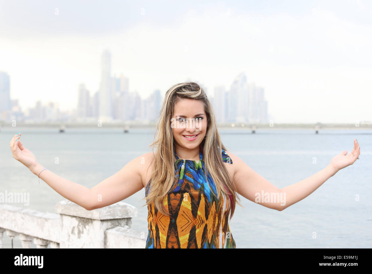 Beautiful girl with open arms outdoor Stock Photo - Alamy