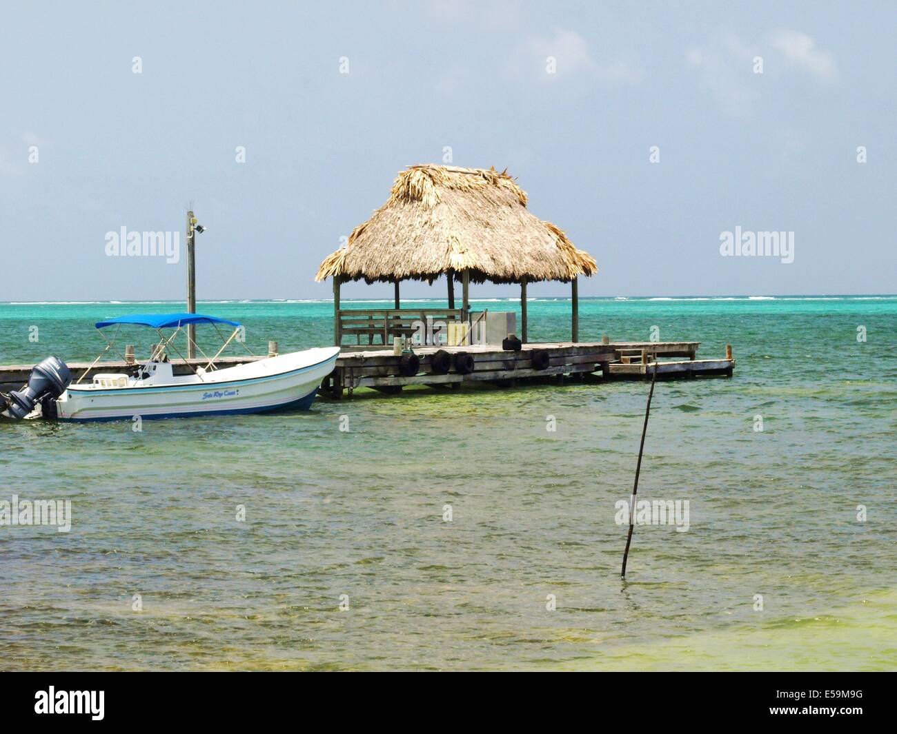 Docked boat on Ambergris Caye, Belize Stock Photo - Alamy