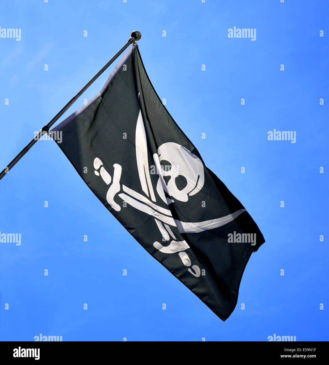 Skull and cross swords flag Stock Photo - Alamy