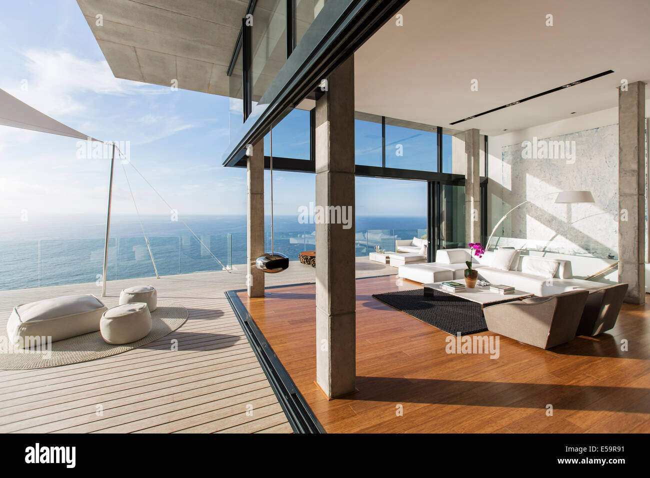 Modern living room and balcony Stock Photo - Alamy