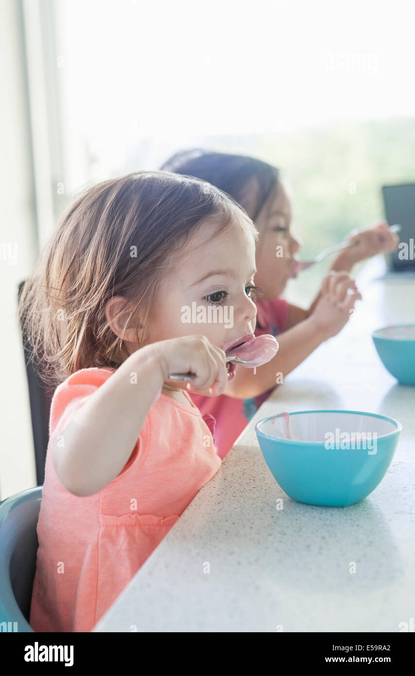Sisters eating breakfast together Stock Photo - Alamy