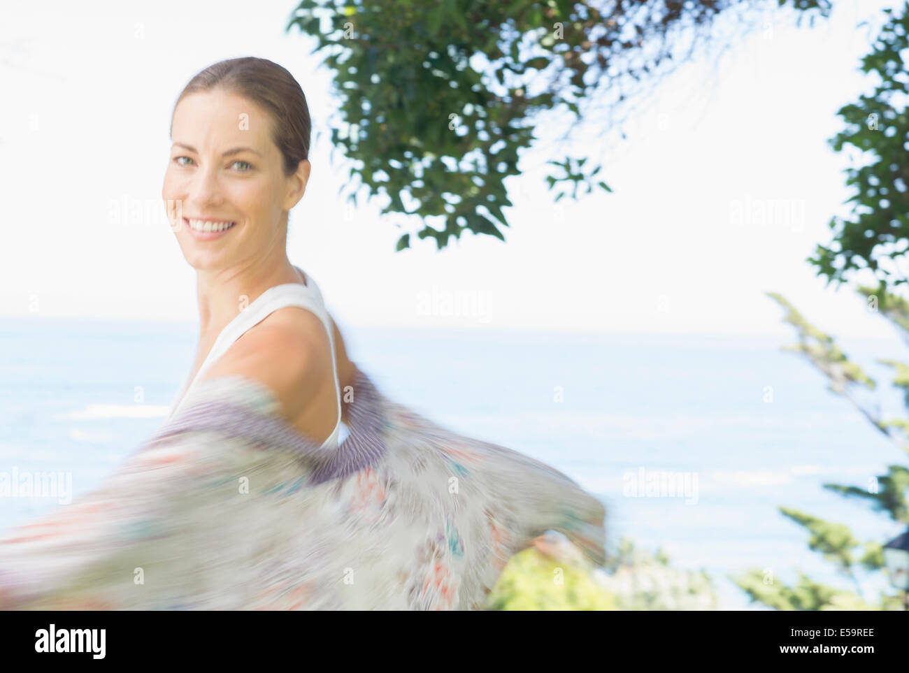 Woman arms outstretched spinning hi-res stock photography and images ...