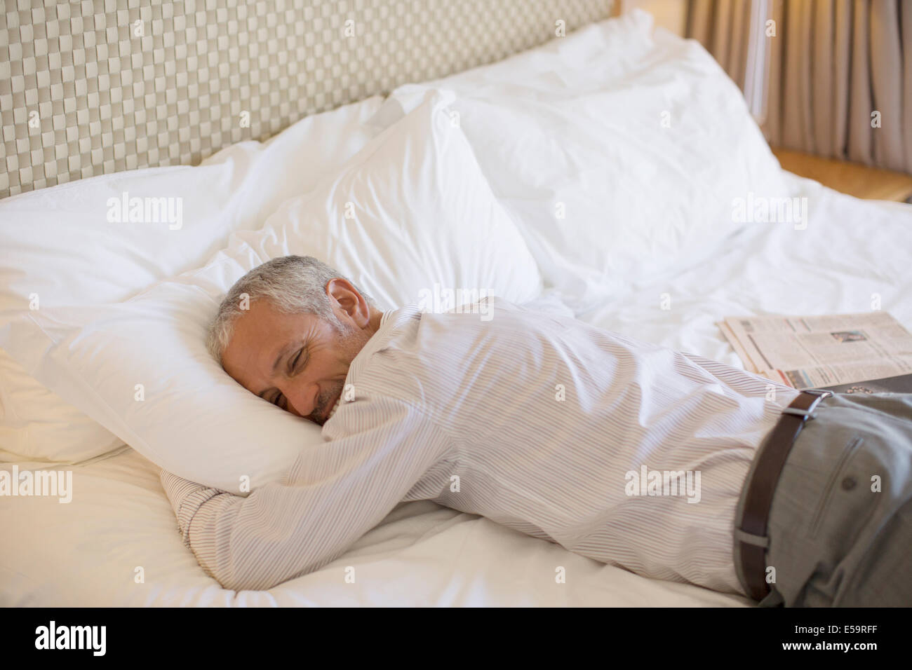 Guy laying down side hi-res stock photography and images - Alamy