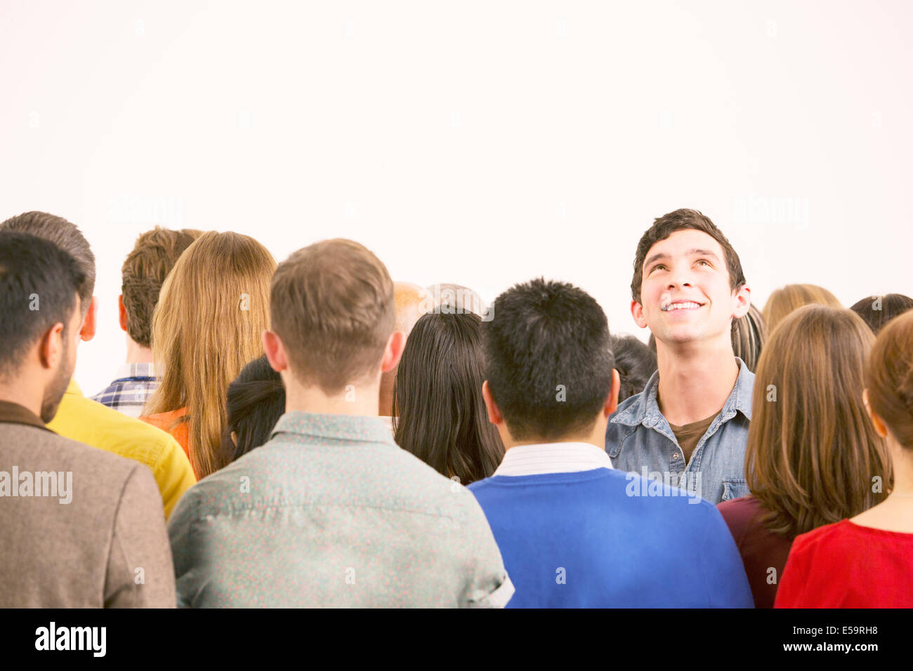 Standing out from crowd concept with businessman hi-res stock ...