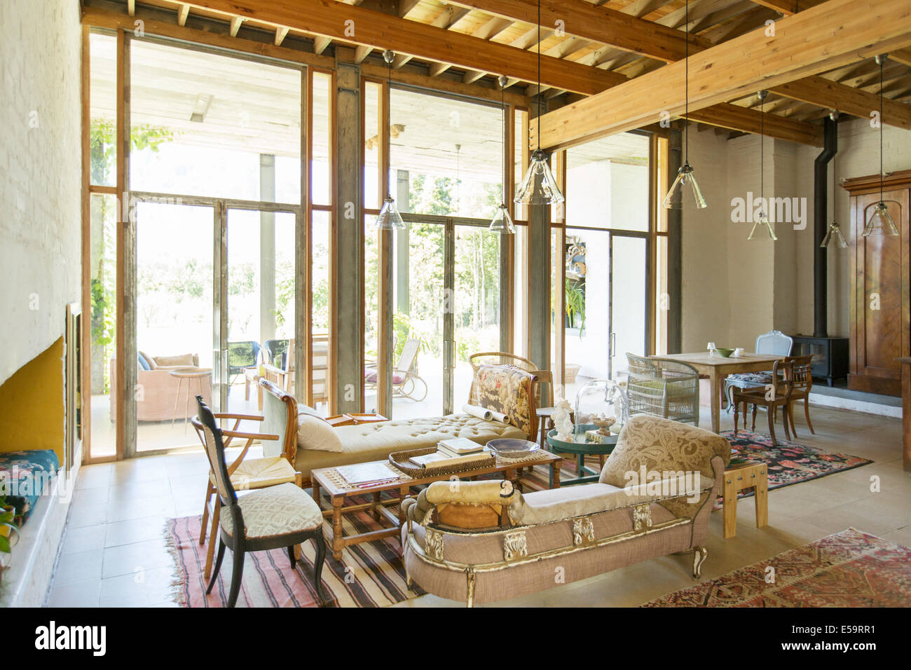 Living and dining area of rustic house Stock Photo - Alamy