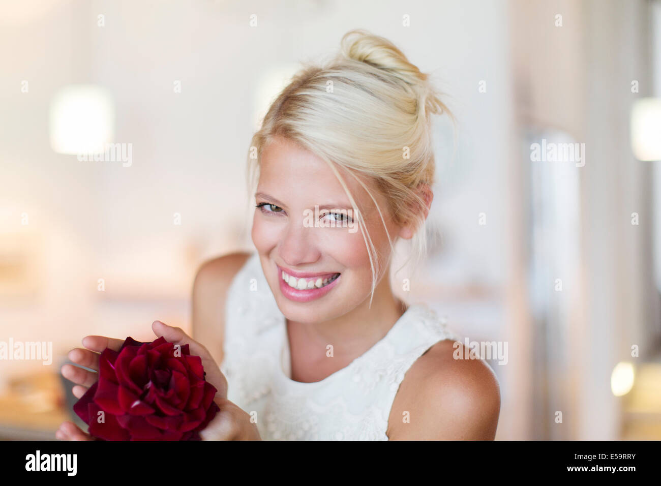 Red flower indoors hi-res stock photography and images - Alamy