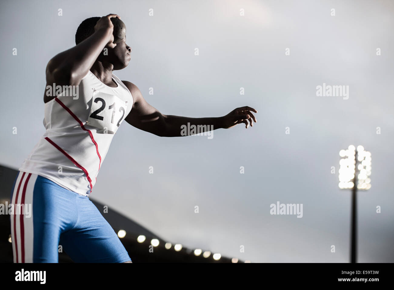 Competitor competing throwing shot put hi-res stock photography and ...