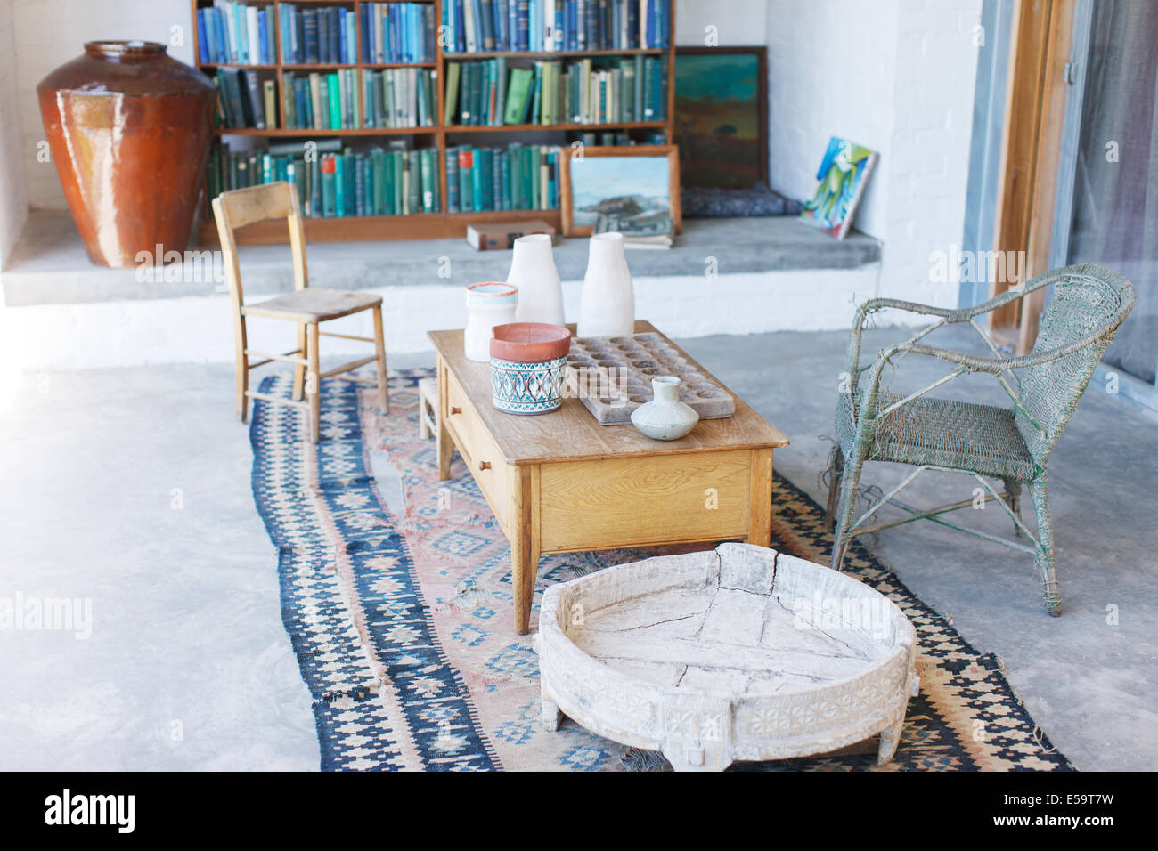 Coffee table and chairs in rustic study Stock Photo - Alamy