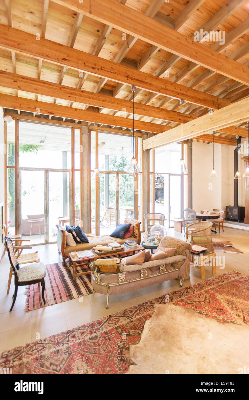 Sofas and coffee table in rustic living room Stock Photo - Alamy