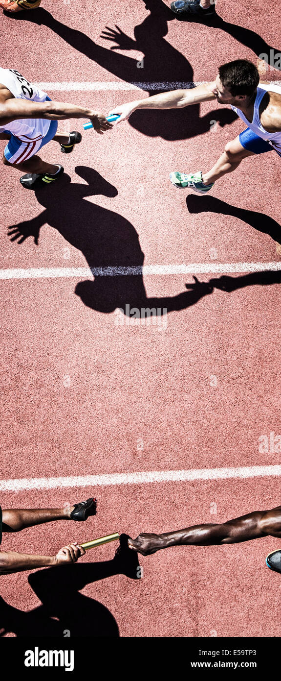 Athlete relay baton hi-res stock photography and images - Alamy