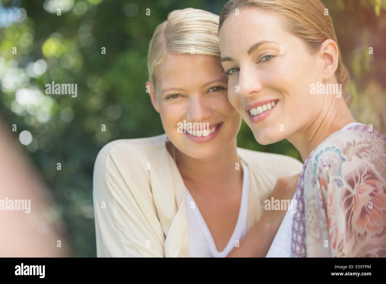 Women smiling together outdoors Stock Photo - Alamy Women smiling together outdoors Stock Photo - Alamy