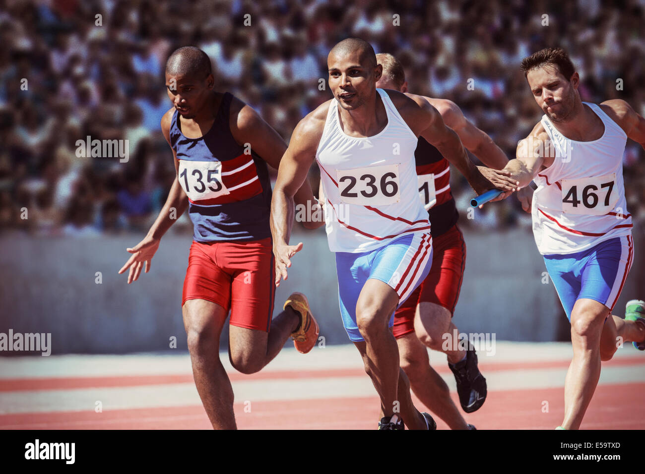 Relay runners hi-res stock photography and images - Alamy