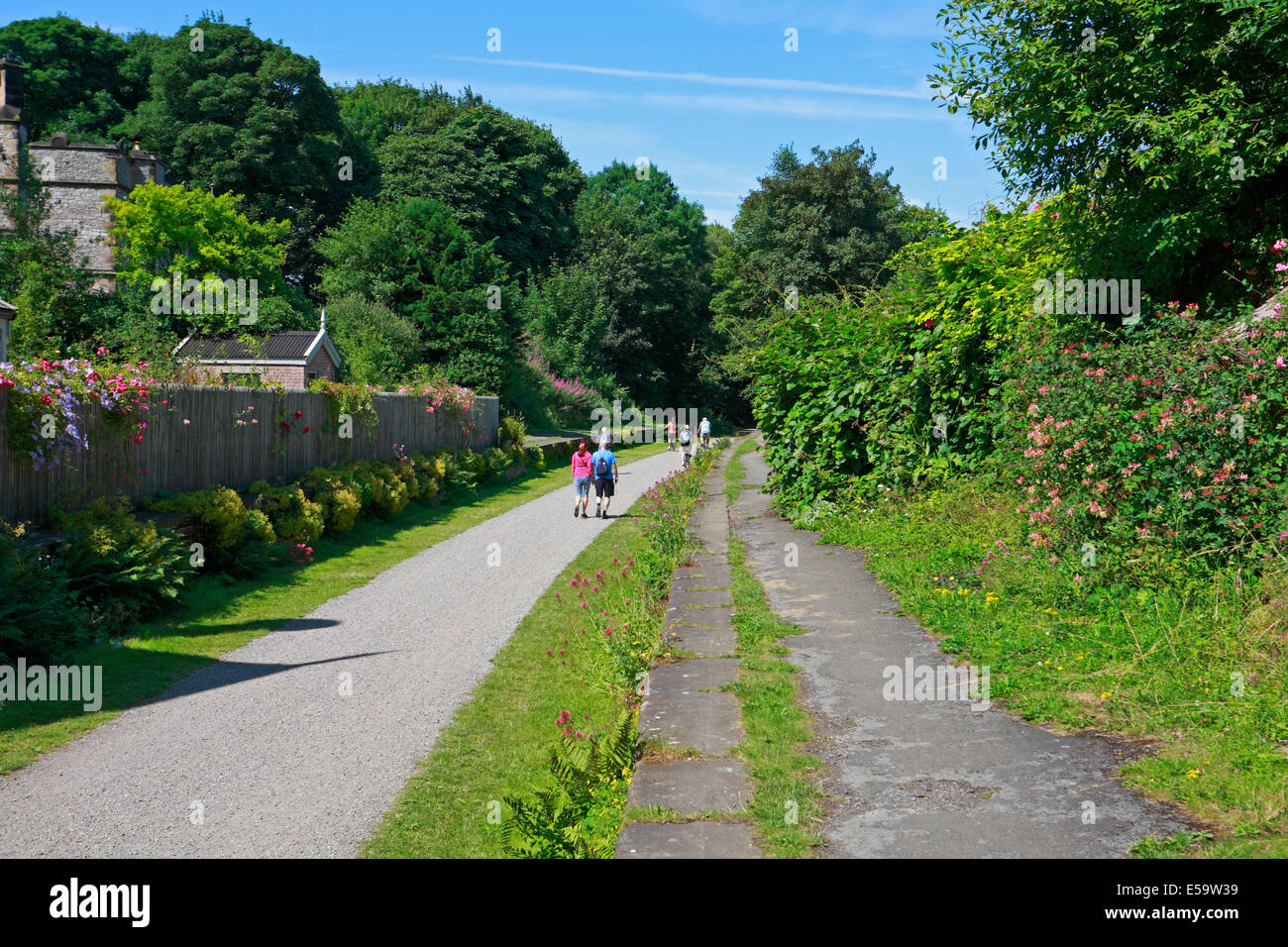Walkers and cyclists on the Monsal Trail near Great Longstone ...