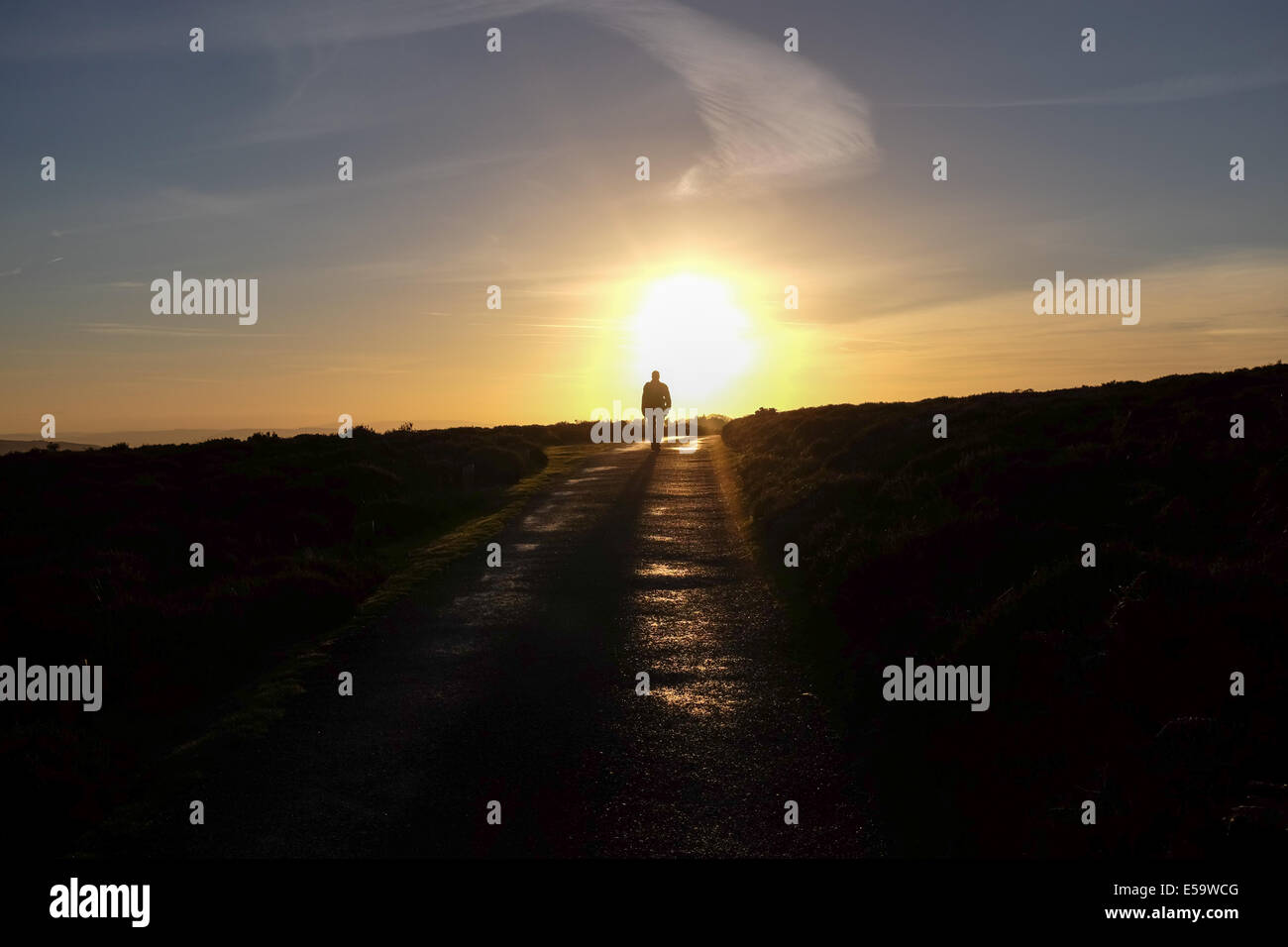Man walking lonely road hi-res stock photography and images - Alamy