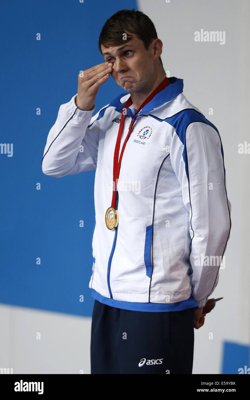 Glasgow. 24th July, 2014. Ross Murdoch of Scotland brushes away tears ...