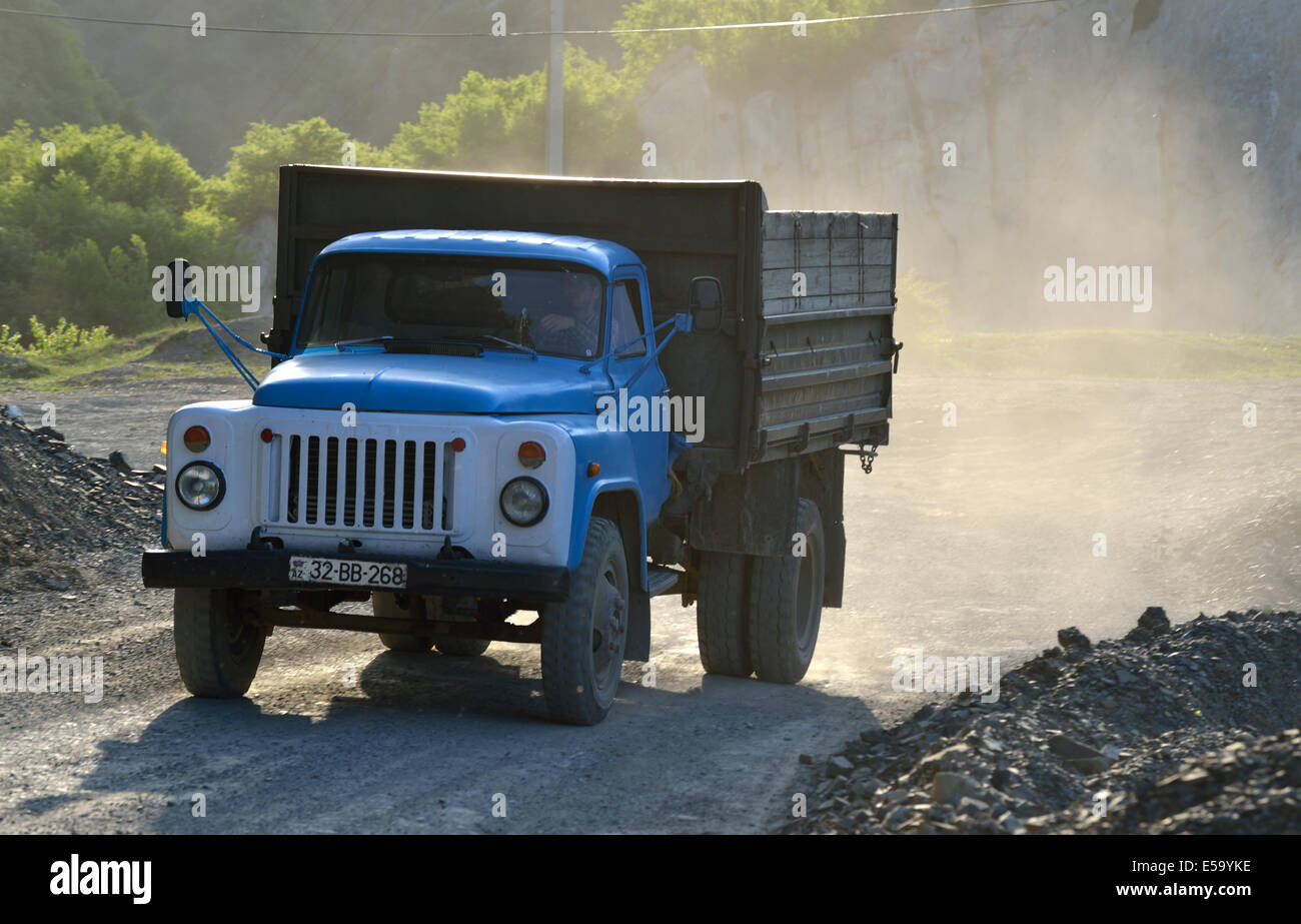 Old Soviet-made Zil truck on a mountain road near the village of Lahic ...