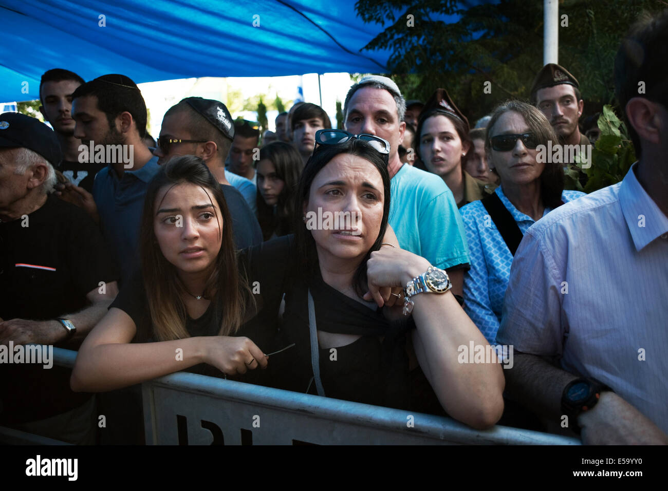 Kfar Azar, Israel, 24th July, 2014. Mourners attend the funeral of ...